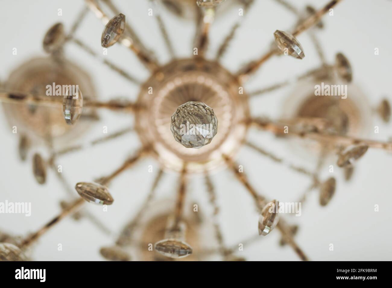 Classic gold crystal chandelier bottom view Stock Photo - Alamy