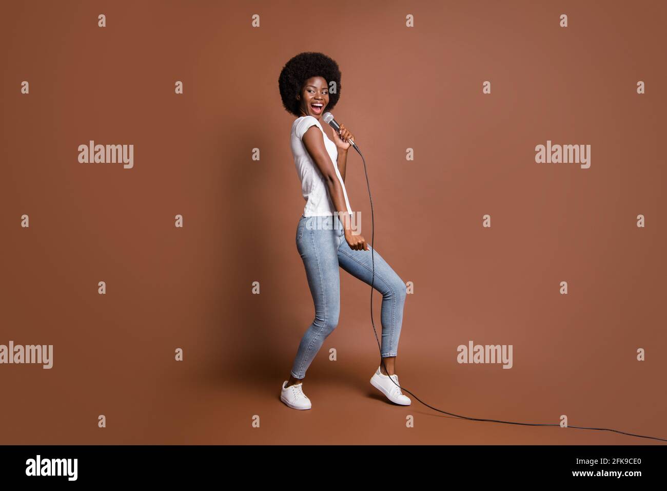 Full length body size photo of girl curious singing in microphone ...