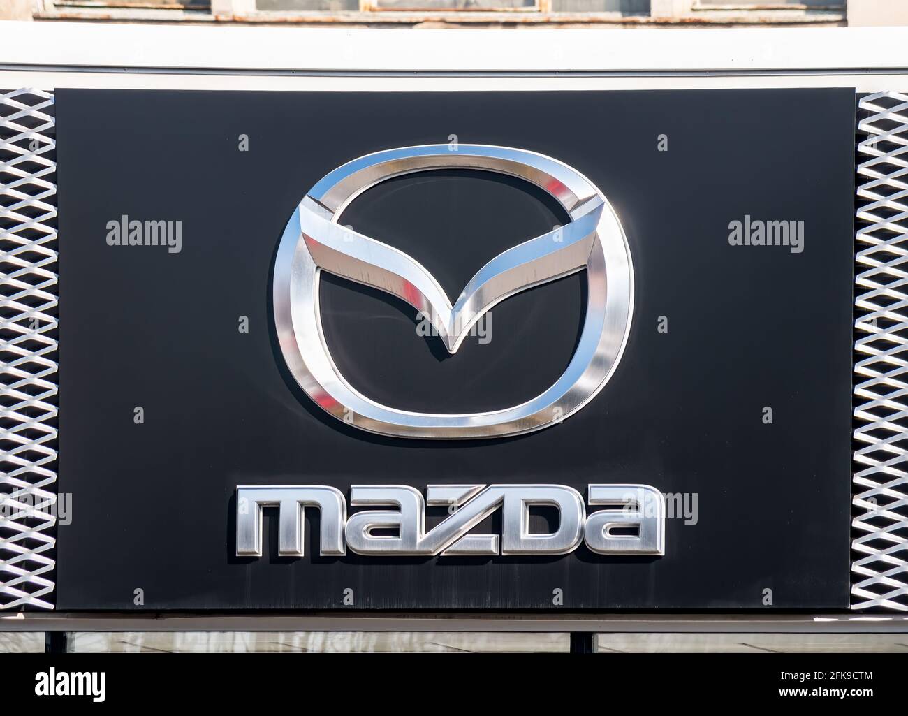 Bucharest,Romania - 03.13.2021: Mazda logo or sign at the entrance of a ...