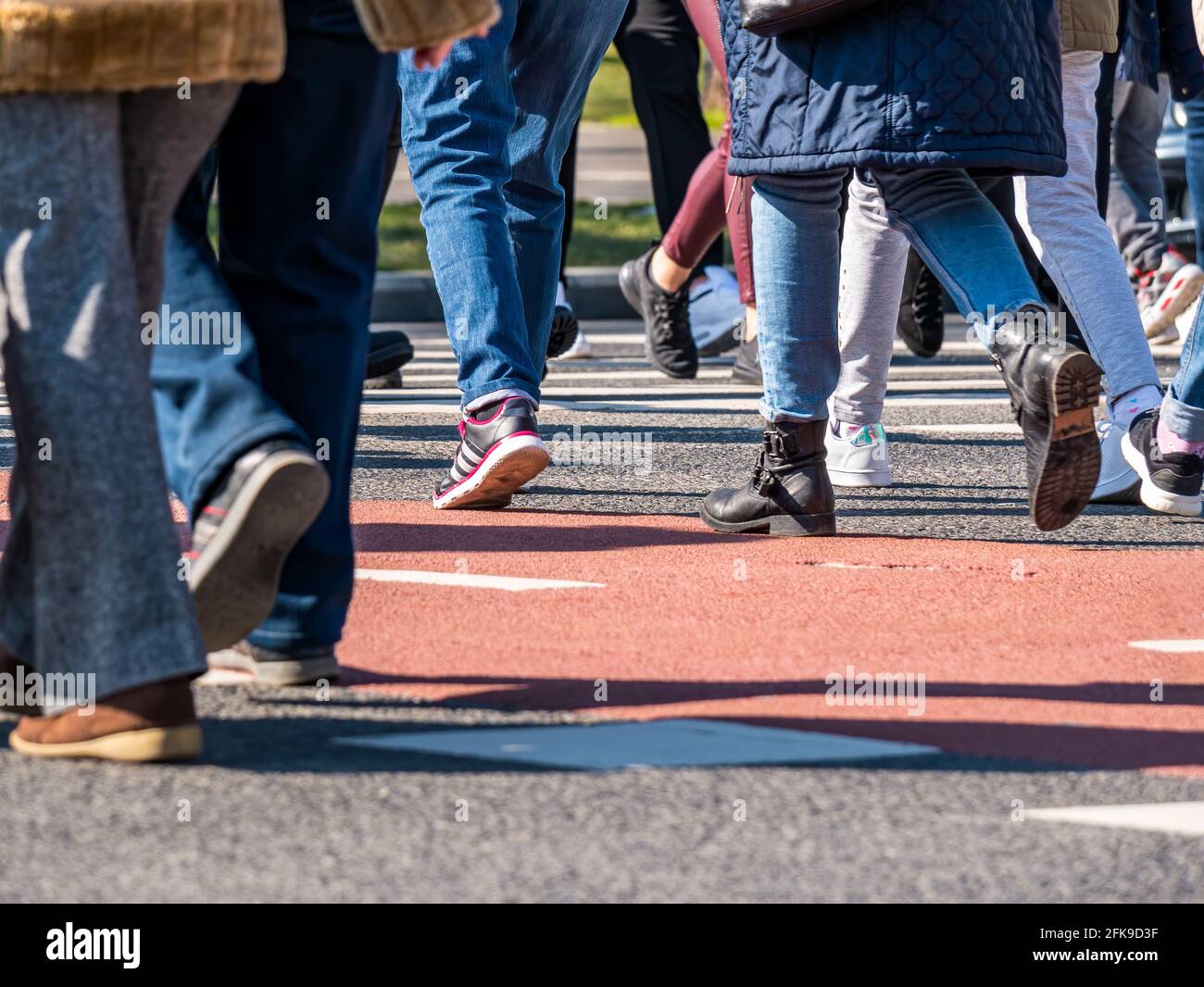 Close up feet people crossing hi-res stock photography and images - Alamy
