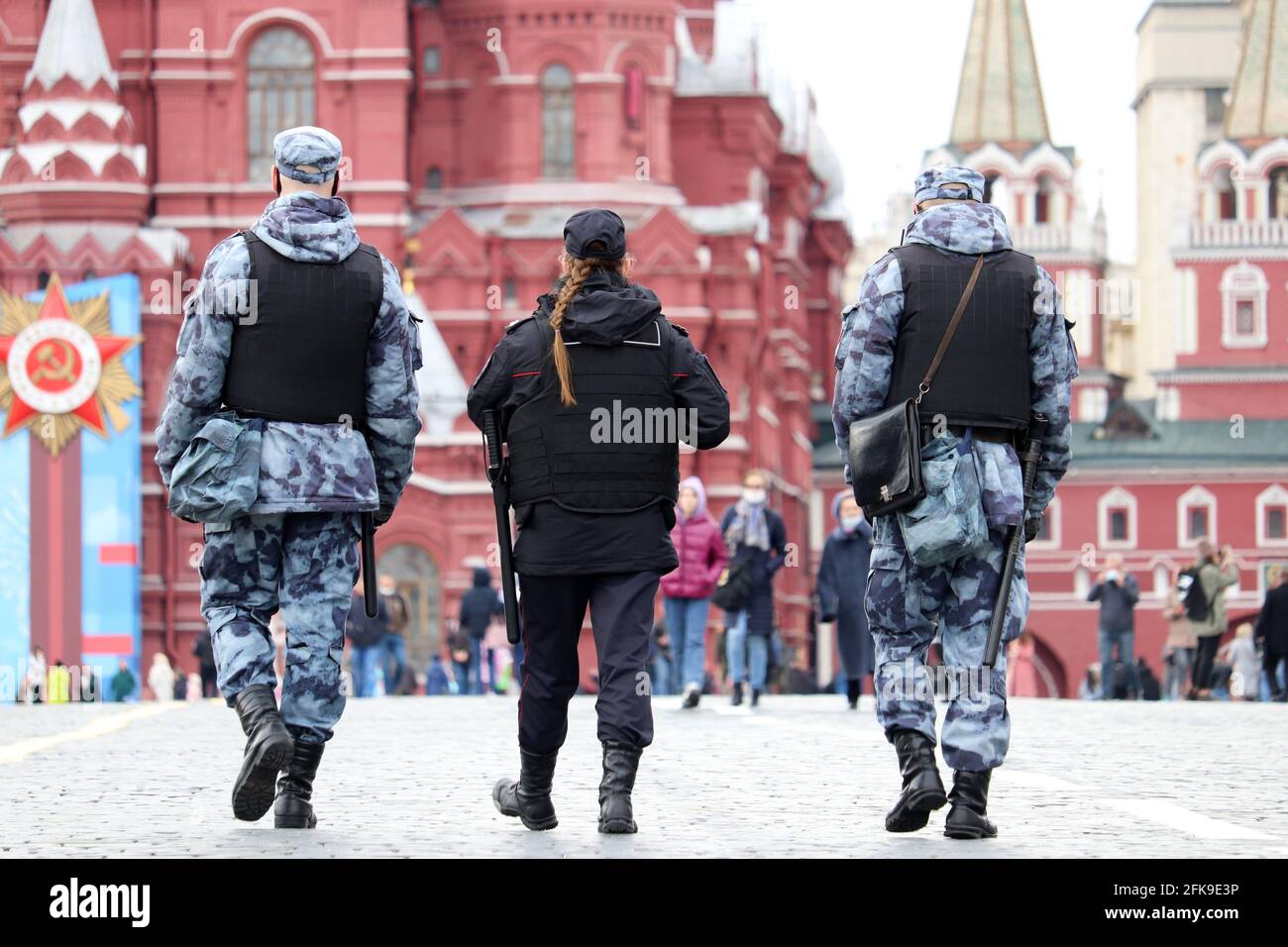 Russian police officers in bulletproof vests patrol the Red Square ...
