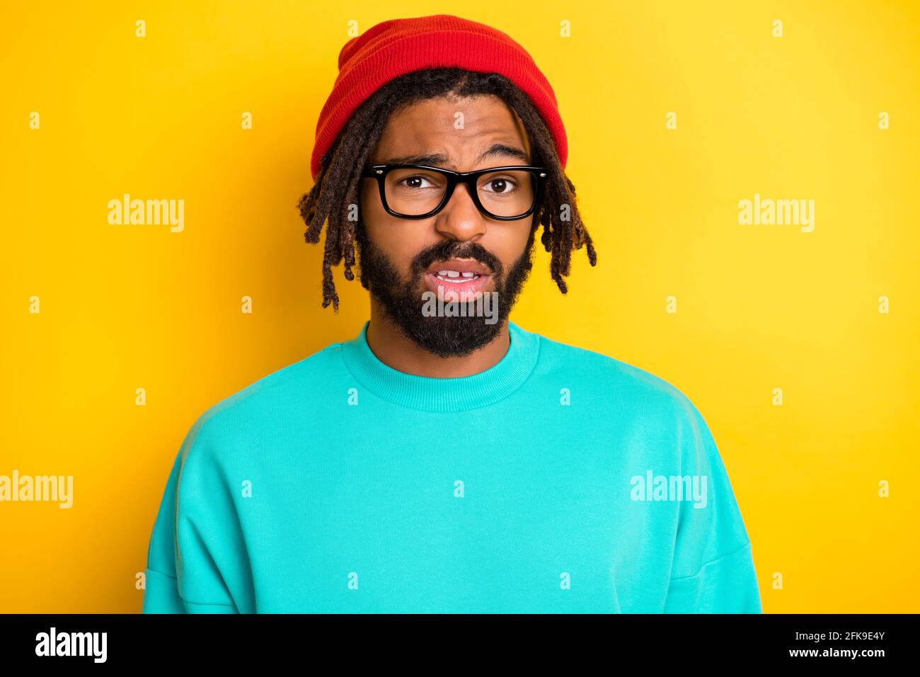 Photo of young african man unhappy sad upset uncertain unsure wear ...