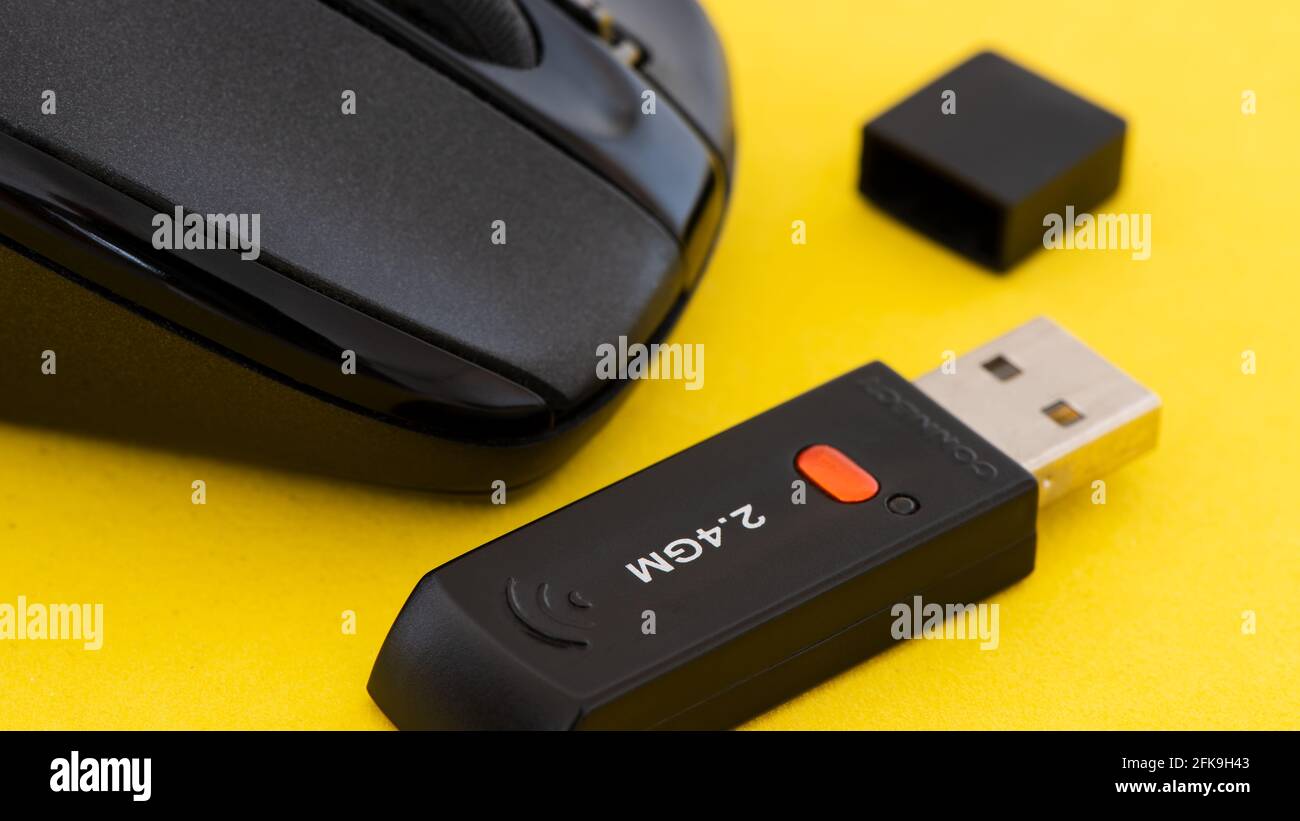 Wireless computer mouse with wifi adapter on yellow background Stock ...