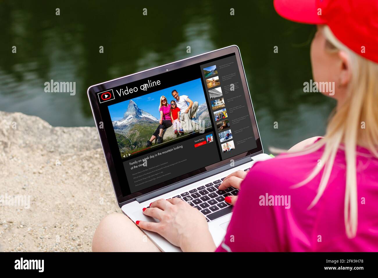 Watching youtube video on laptop hi-res stock photography and images ...