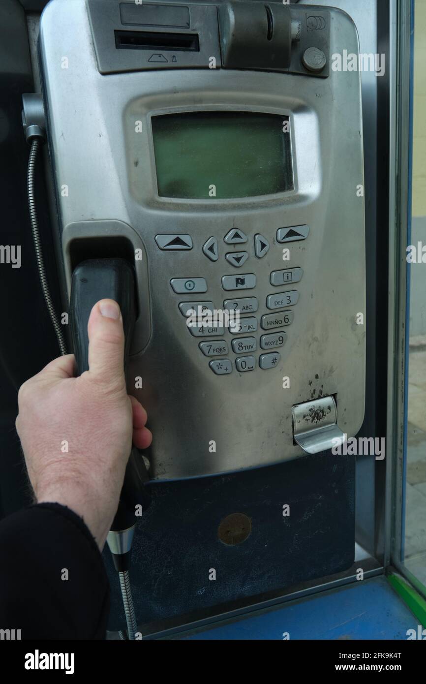 Old pay phone on street hi-res stock photography and images - Alamy