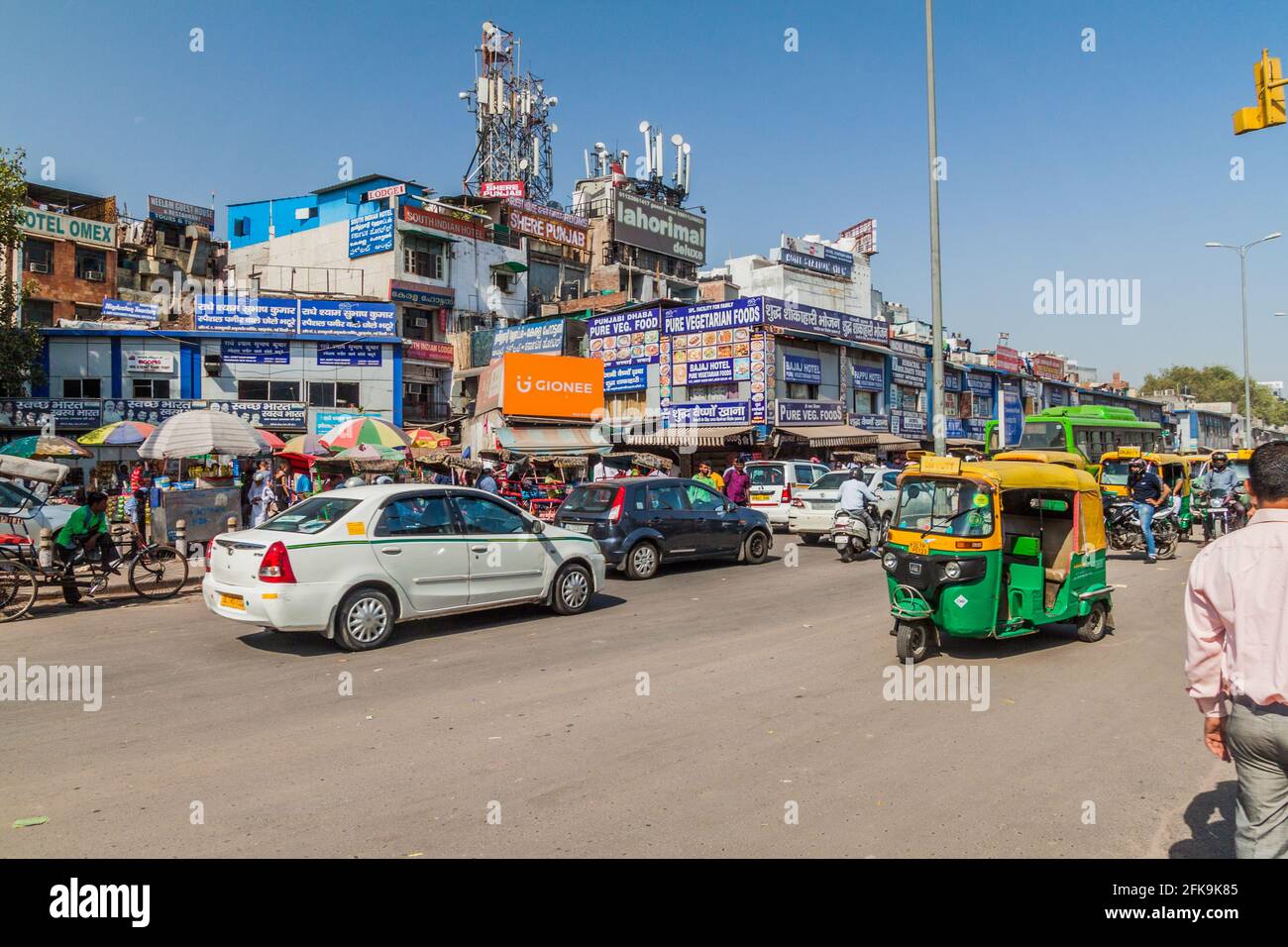 DELHI, INDIA - OCTOBER 22, 2016: Street traffic in the center of Delhi ...