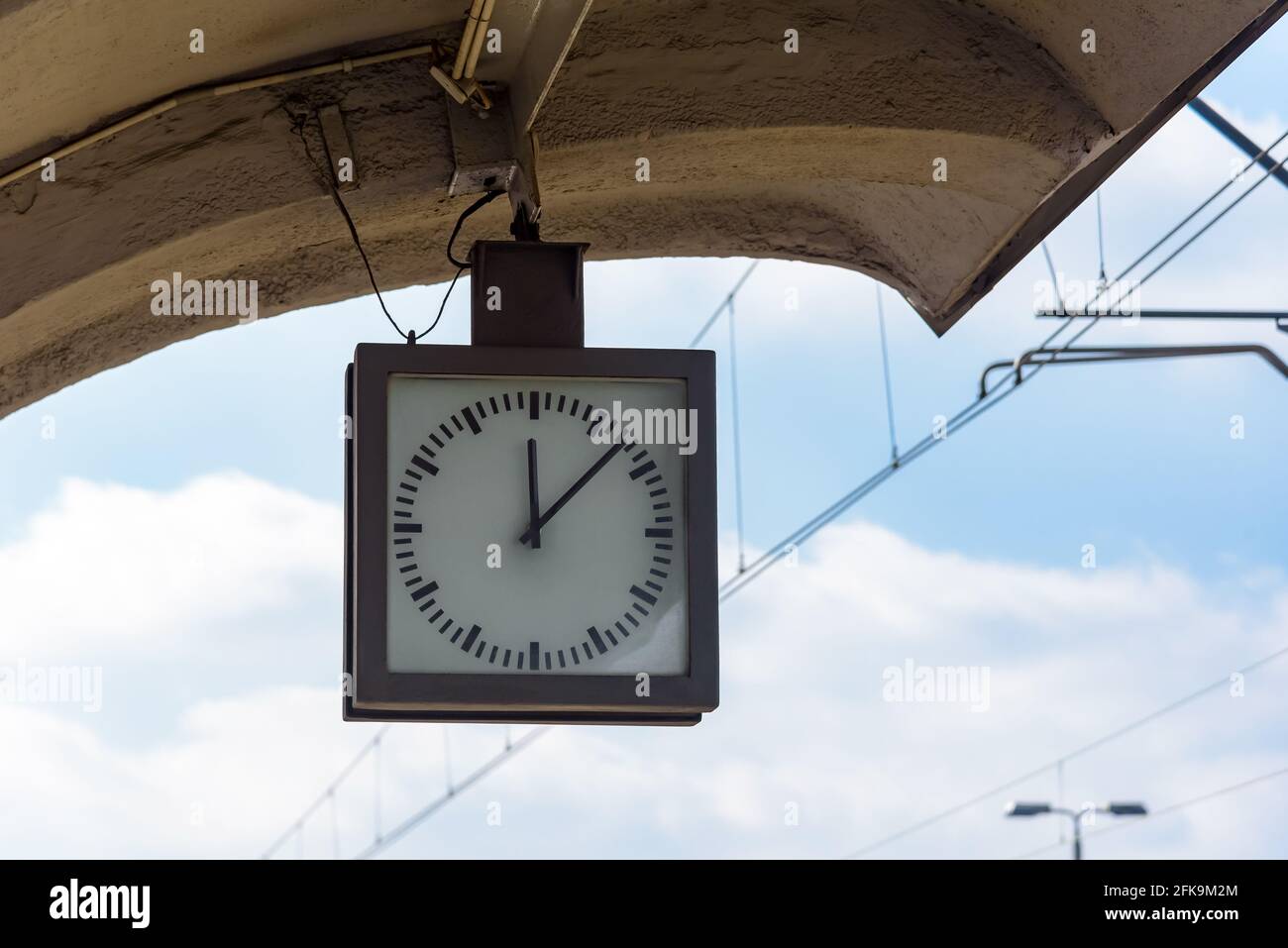 Closeup of analog clock on the train station Stock Photo - Alamy