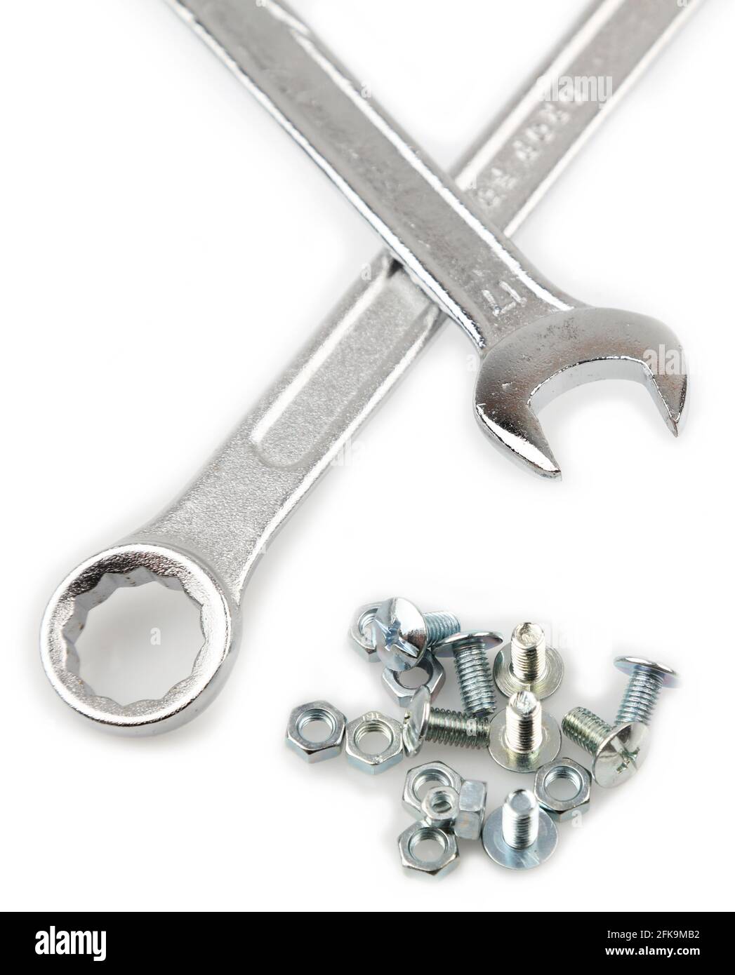 Two spanners, nuts and bolts Stock Photo - Alamy