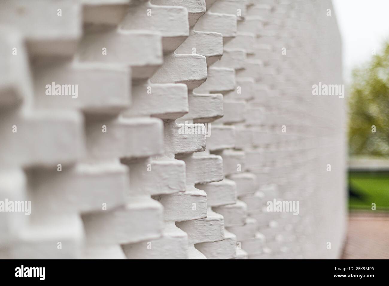 White stone bricks set at 45 degrees in a wall Stock Photo - Alamy