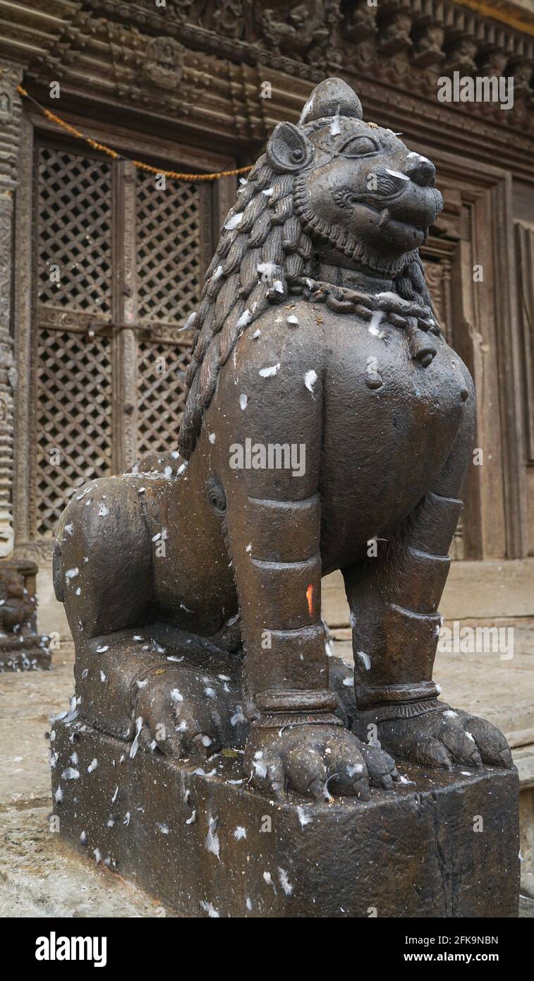 bronze lion statue in Kathmandu, Nepal, UNESCO world heritage site ...