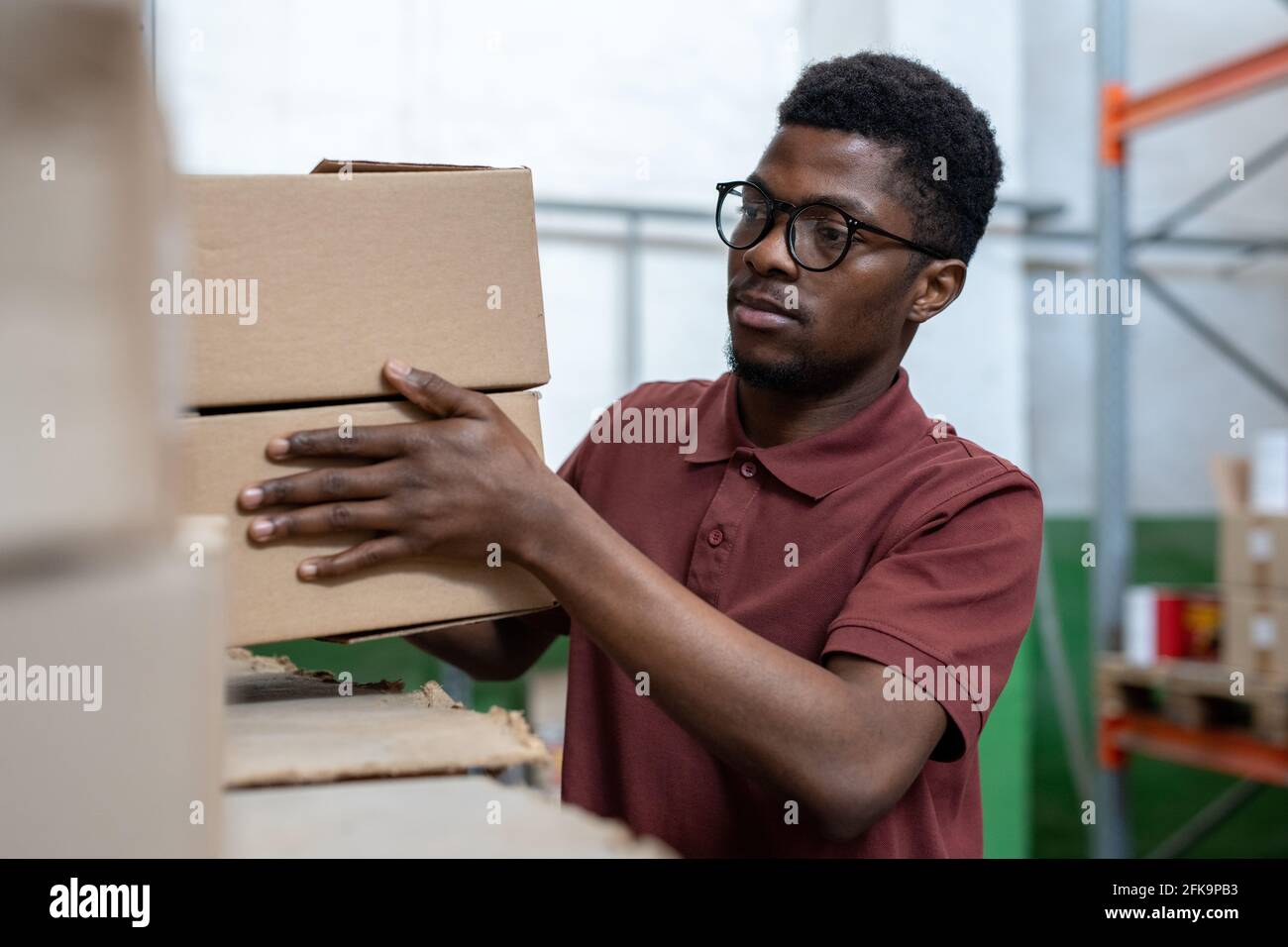 Stacking boxes hi-res stock photography and images - Alamy