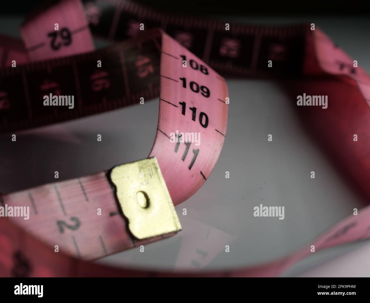 Close up tailor measuring tape on white table background. White ...