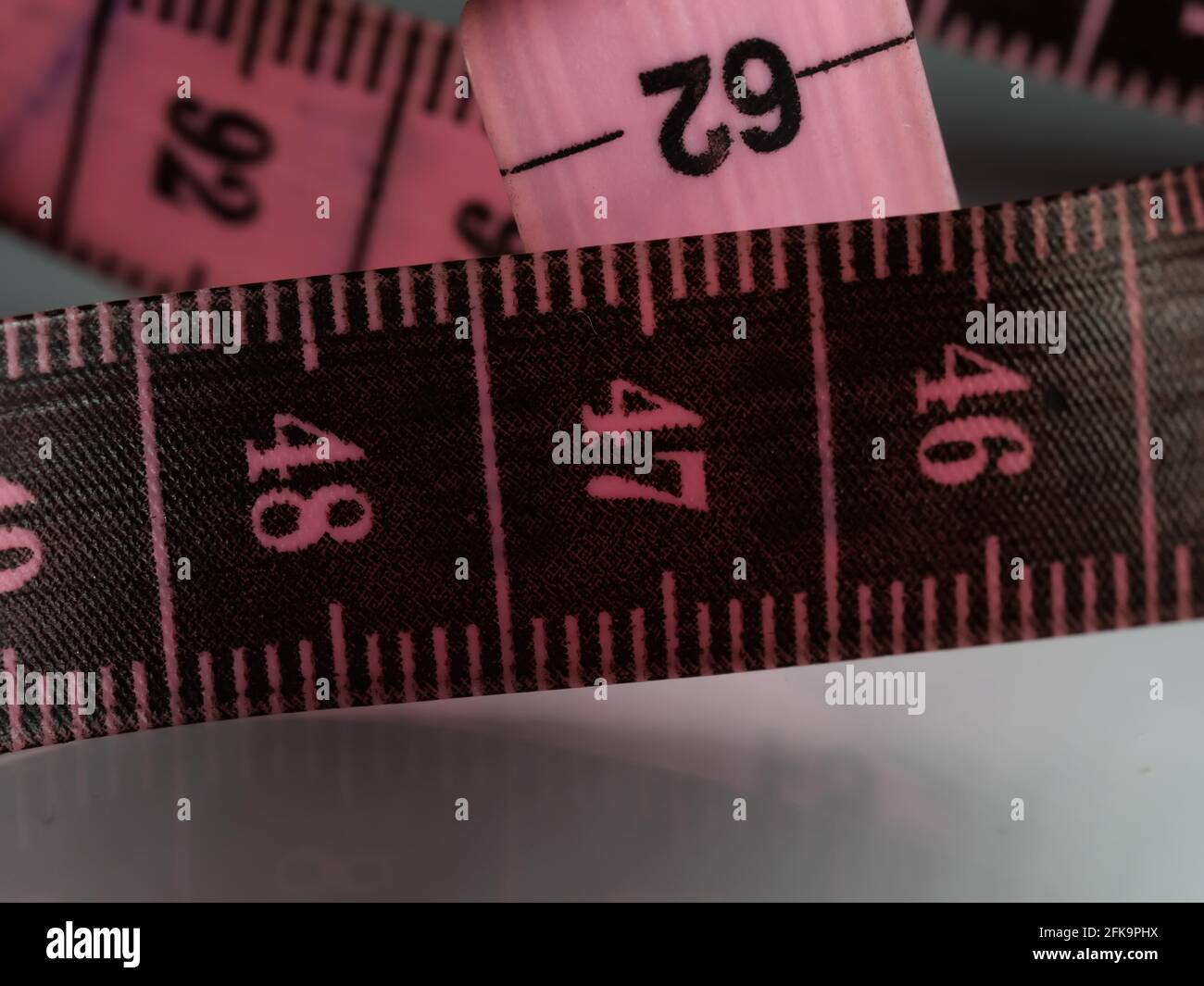 Close up tailor measuring tape on white table background. White ...