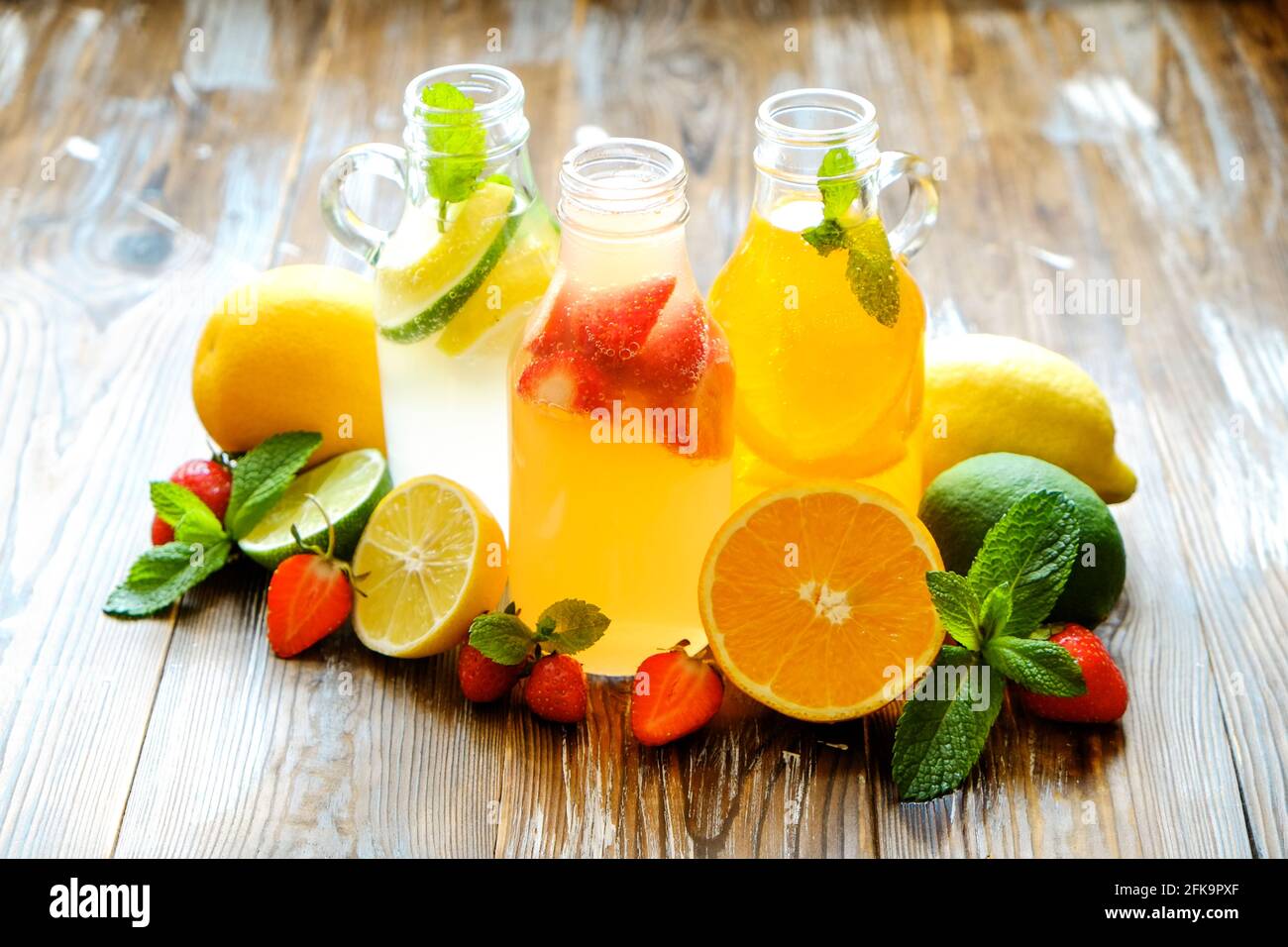Three vintage bottles of fresh ice cold lemonade, different taste ...