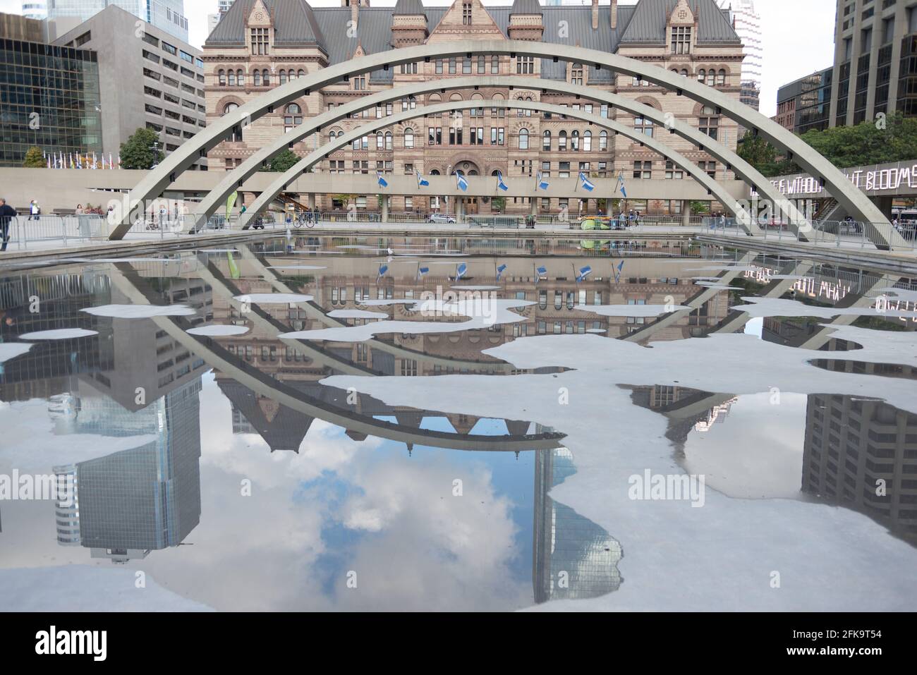 Nathan Phillips Square reflecting pool and arches - with Nuit Blanche ...