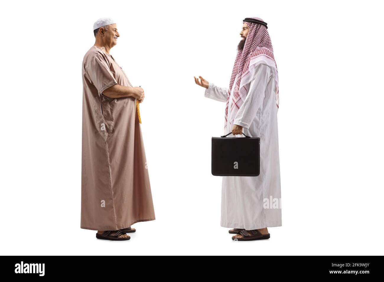 Full length profile shot of a muslim man and a saudi arab businessman ...