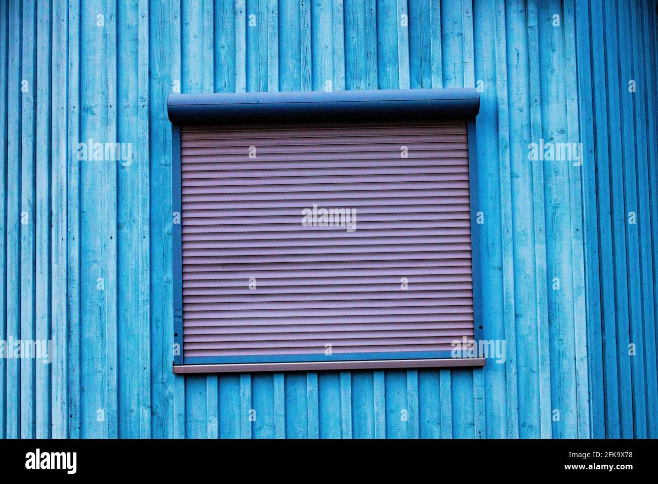 Dyed blue roller shutter texture wall Stock Photo - Alamy