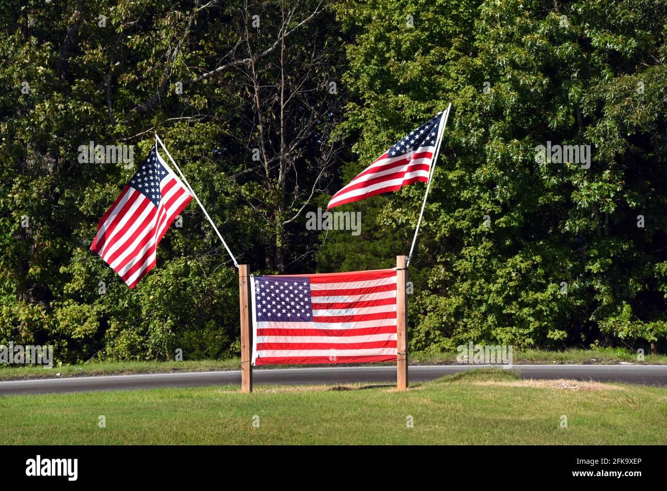 Three flags on flag poles hi-res stock photography and images - Alamy