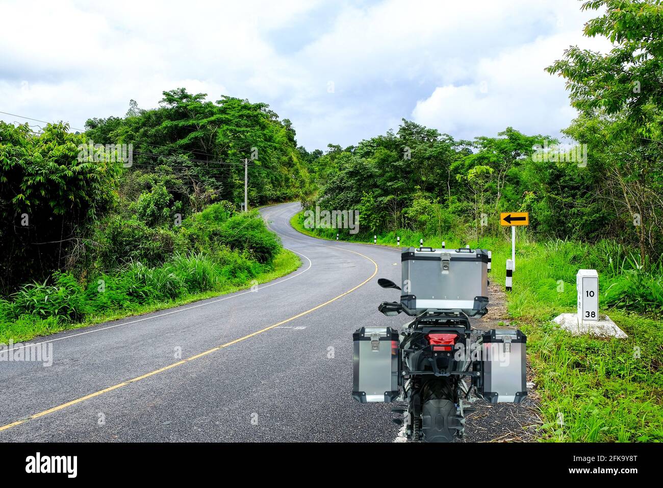 Back view of touring motorbike with aluminum box for contain baggage ...