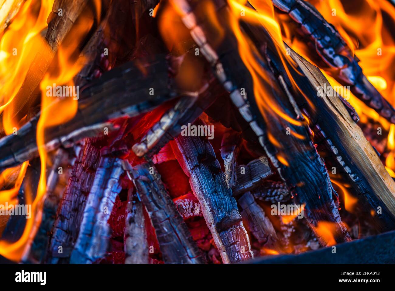 Burning wood chips to form coal. Barbecue preparation, fire before ...