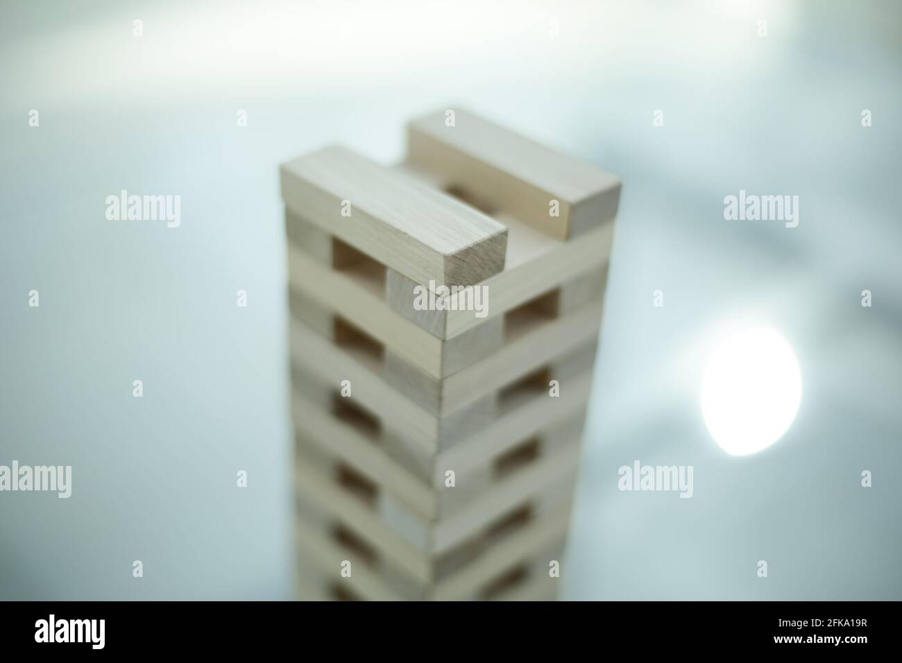 Blocks wood game jenga on white background Stock Photo - Alamy