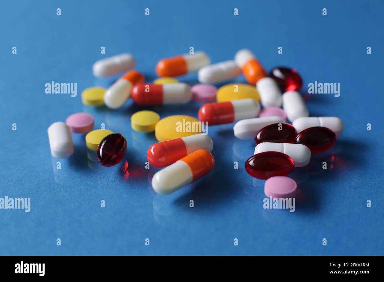 Colorful of tablets and capsules pill in blister packaging arranged ...