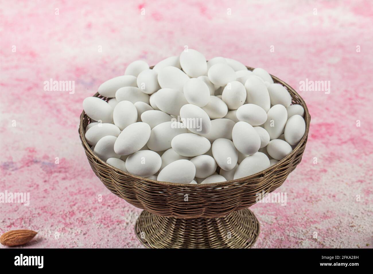 Close up of a group of white sugared almonds. Almond candies. Candies ...