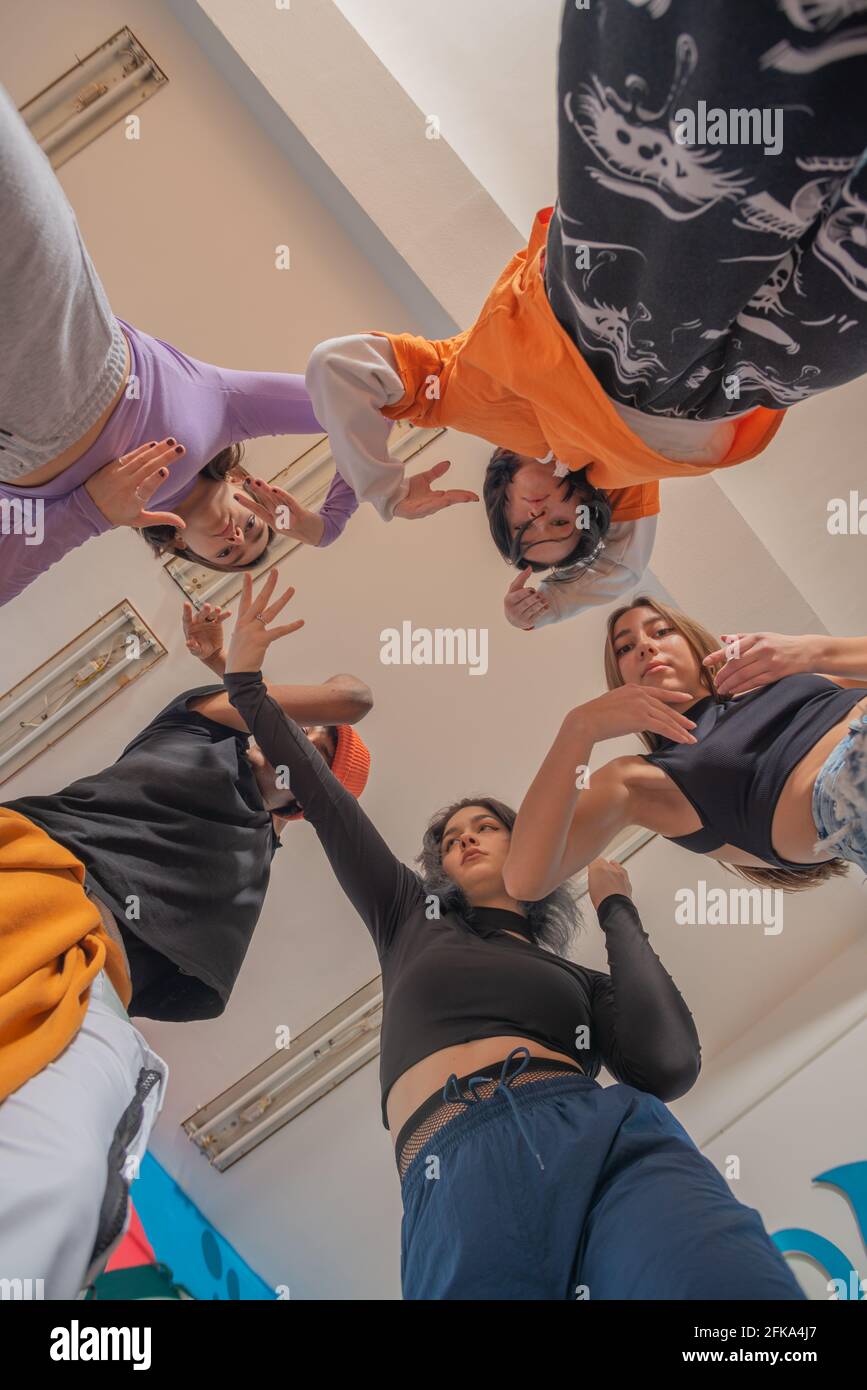 Group of hip hop dancers permorming their dance. Crew making show in an ...