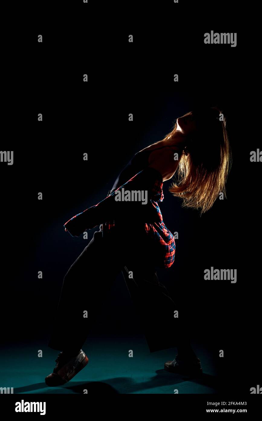 Athletic dancer performing an element of dance gymnastics Stock Photo ...
