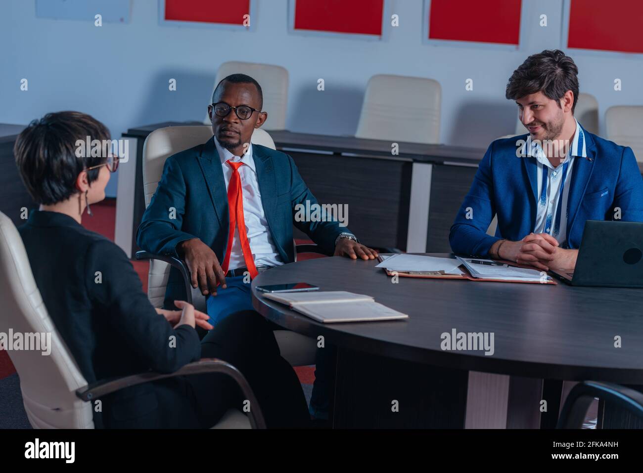 Corporate business team and manager in a meeting. Team building meeting ...