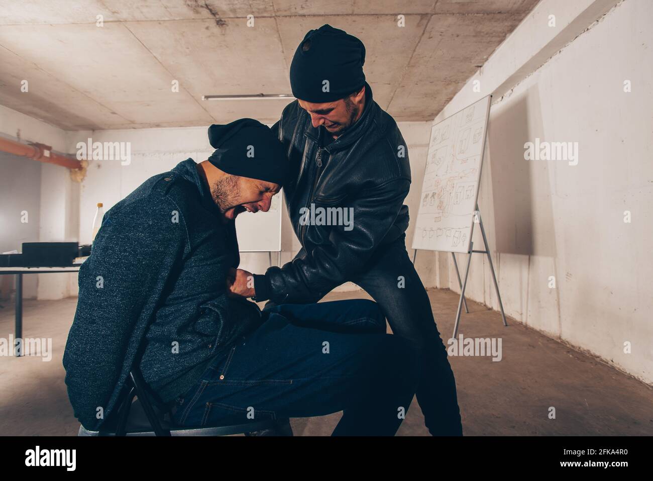 Aggressive man punching with fist during the fight Stock Photo - Alamy