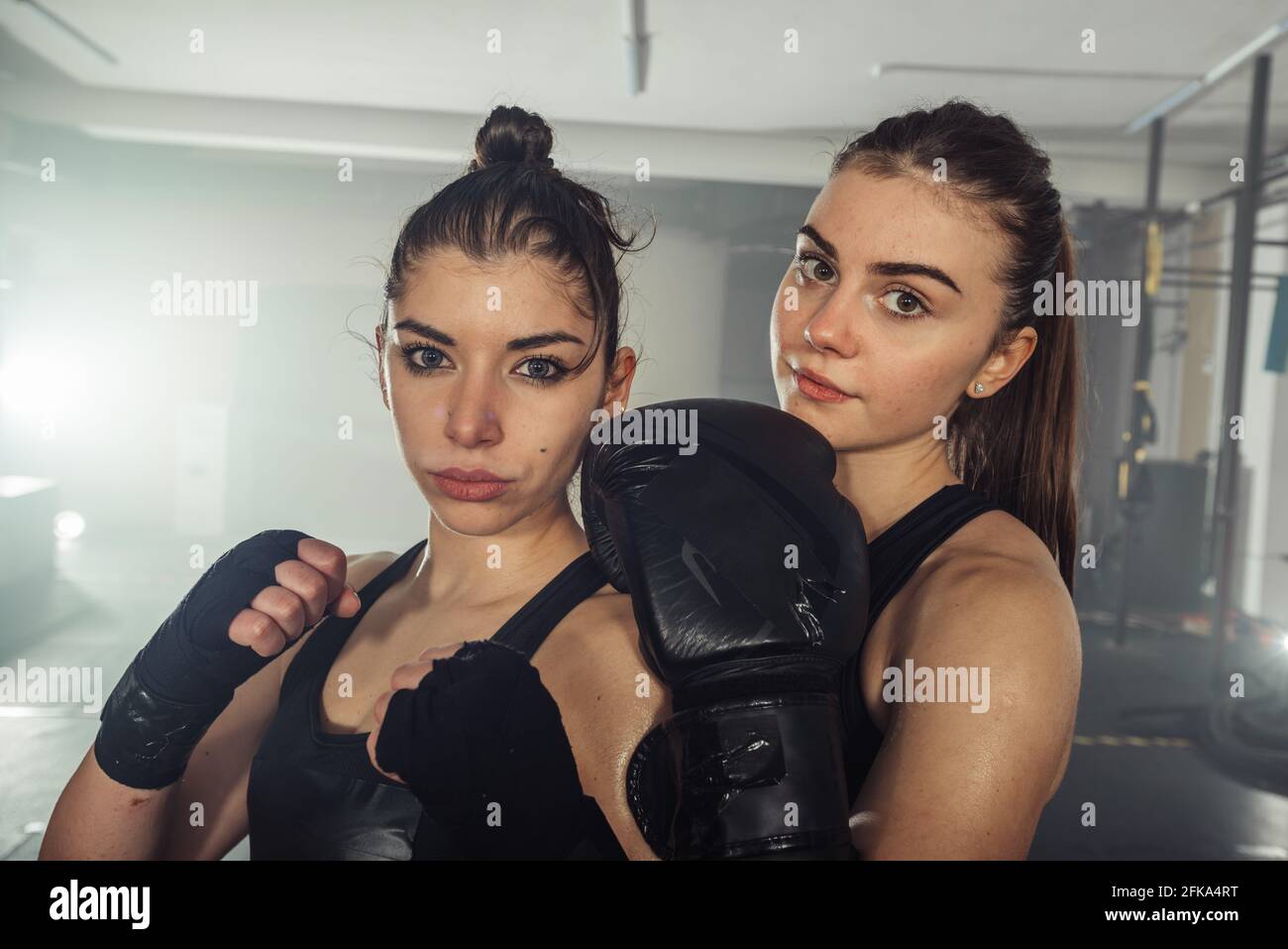 Female kickboxer doing a side kick Stock Photo - Alamy