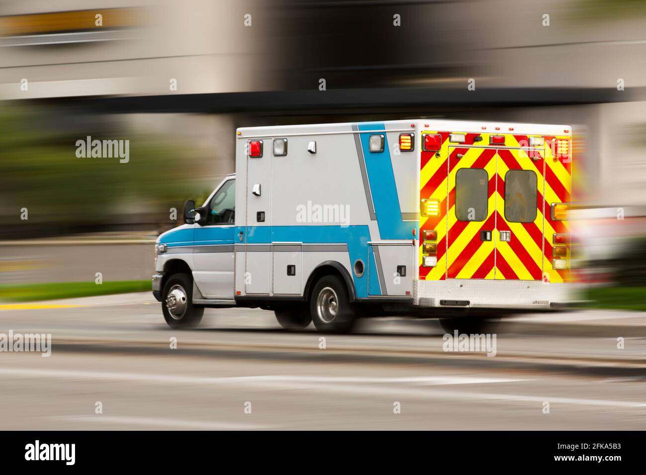 An ambulance responds to the scene of an emergency Stock Photo - Alamy
