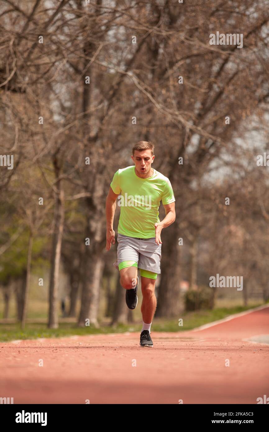 Men running towards camera hi-res stock photography and images - Alamy