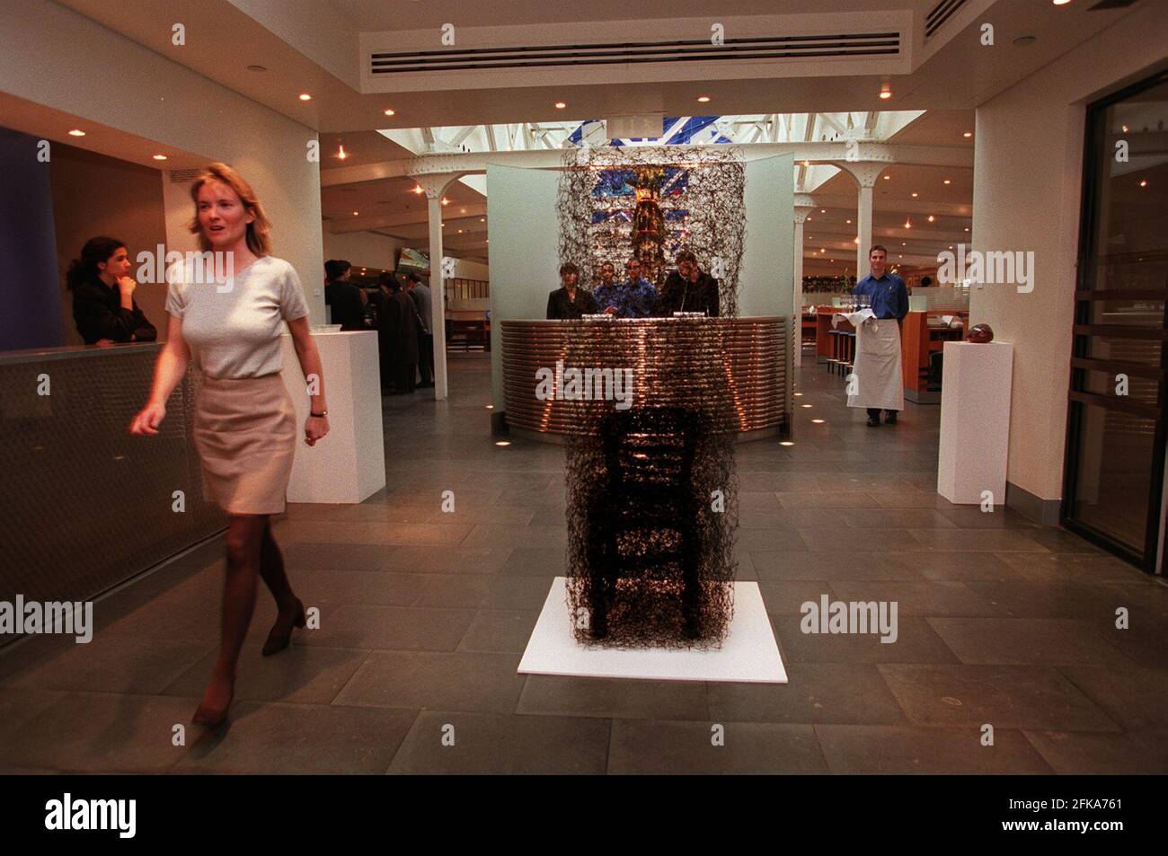 A CHAIR MADE FROM WIRE AND WAX BY DONNA FLEMING IN AN EXHIBITION OF ...