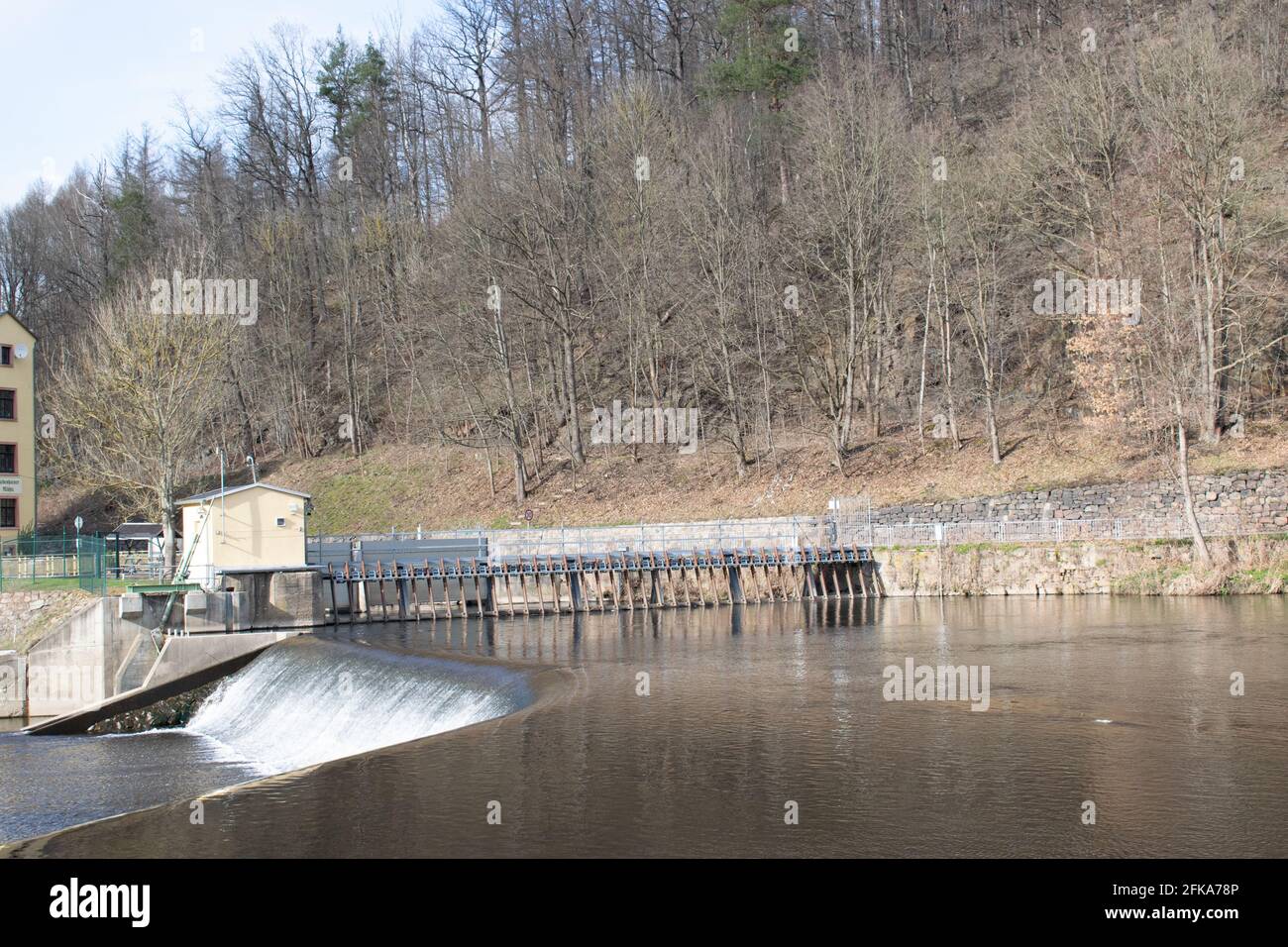 Small dam in an industrial area Stock Photo - Alamy