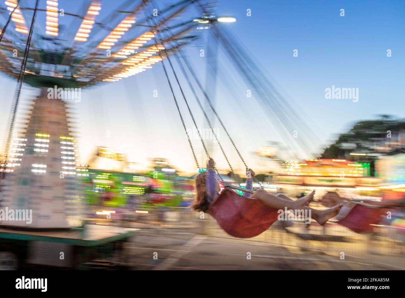 Colorful carnival rides hi-res stock photography and images - Alamy