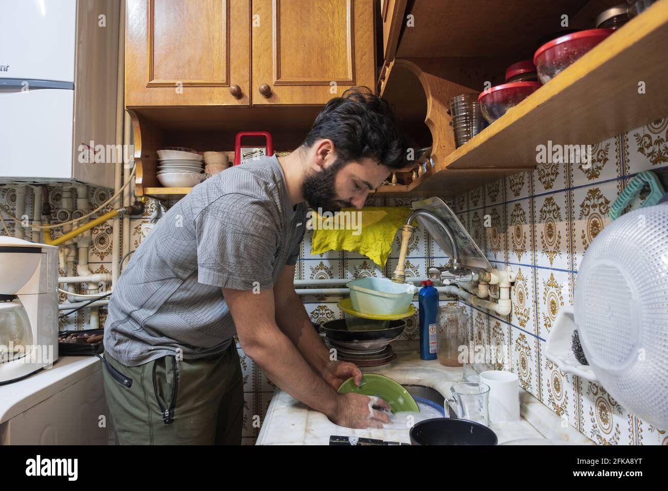 Man Washing Dishes Plates High Resolution Stock Photography and Images ...