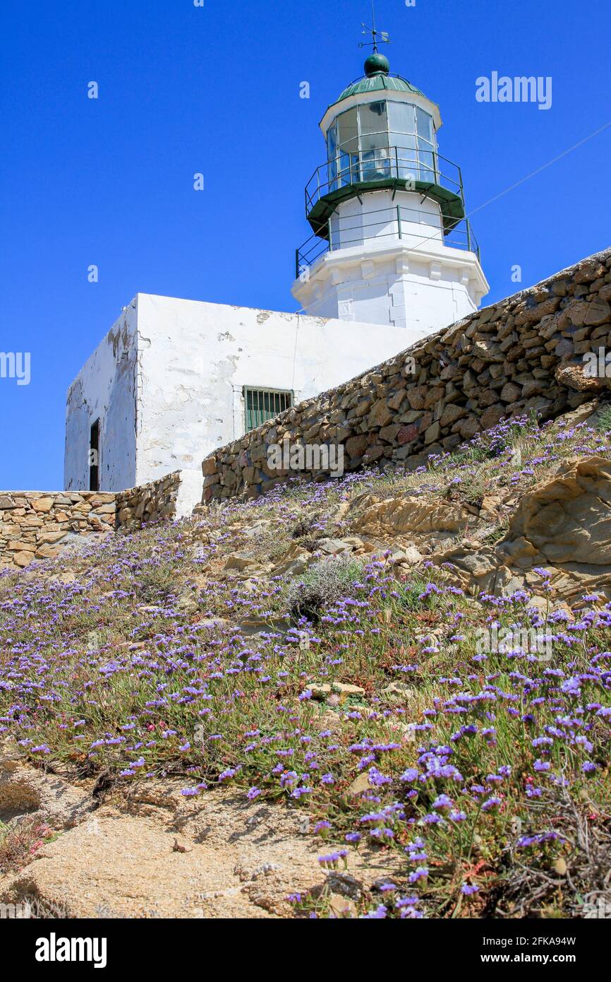 View from below of Mykonos Armenistis Lighthouse with blue sky and ...