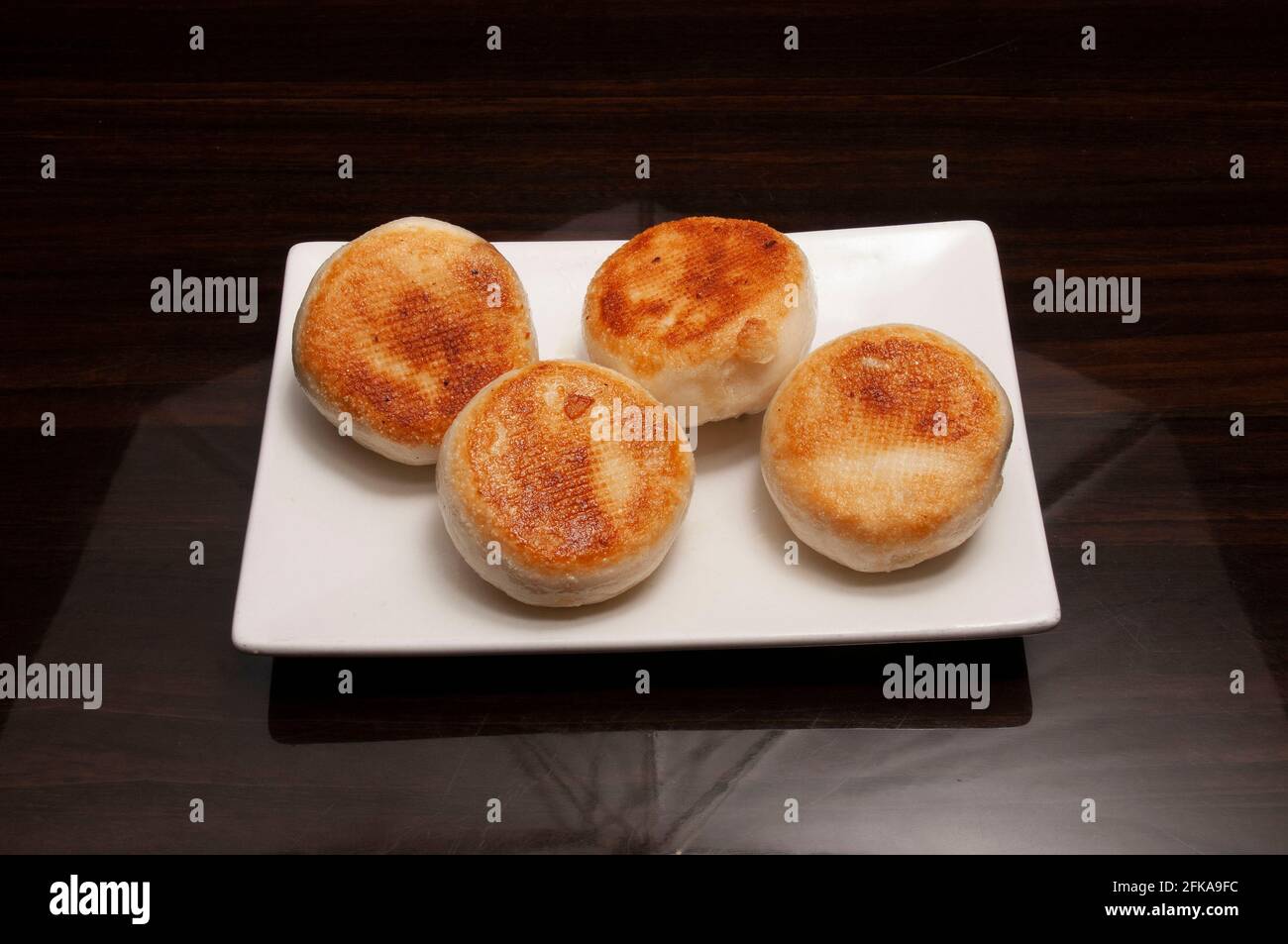 Delicious Chinese dish known as fried pork buns Stock Photo - Alamy