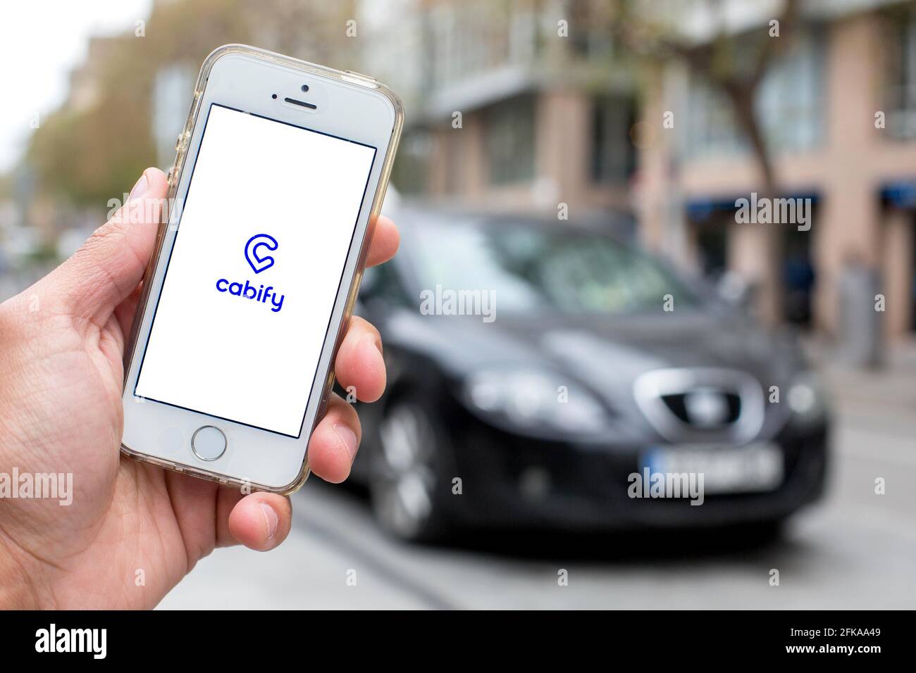 In this photo illustration a Cabify logo seen displayed on a smartphone ...
