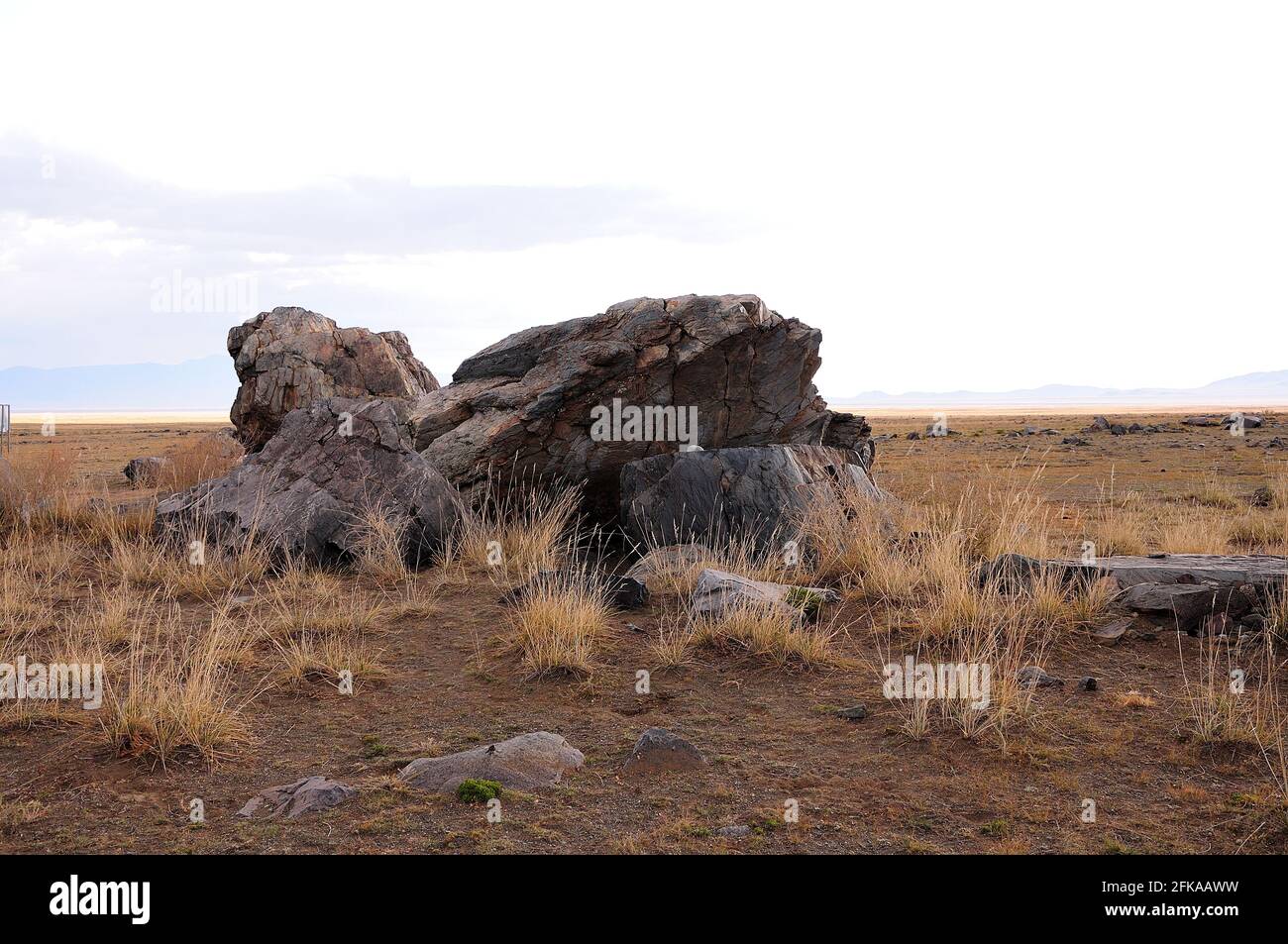 Remains of an ancient stone structure in the autumn steppe ...