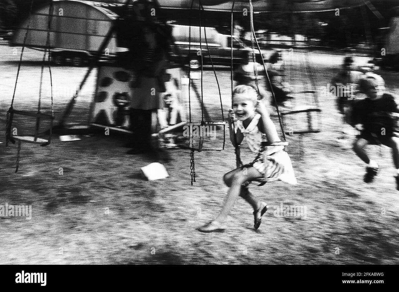Child on the Merry Go Round at a fairground Dbase Stock Photo - Alamy