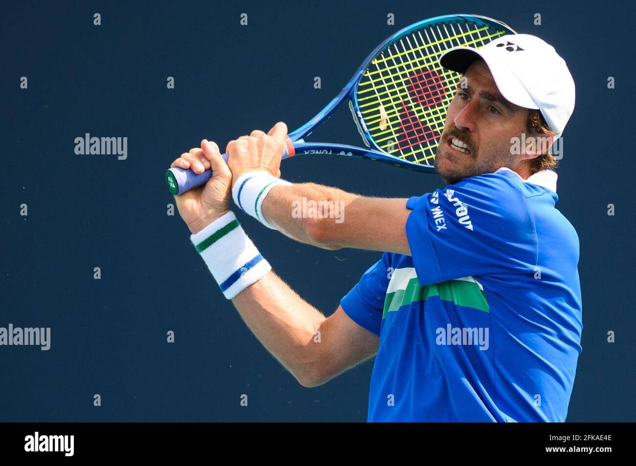 March 24, 2021: Steve Johnson of the United States hits a backhand ...