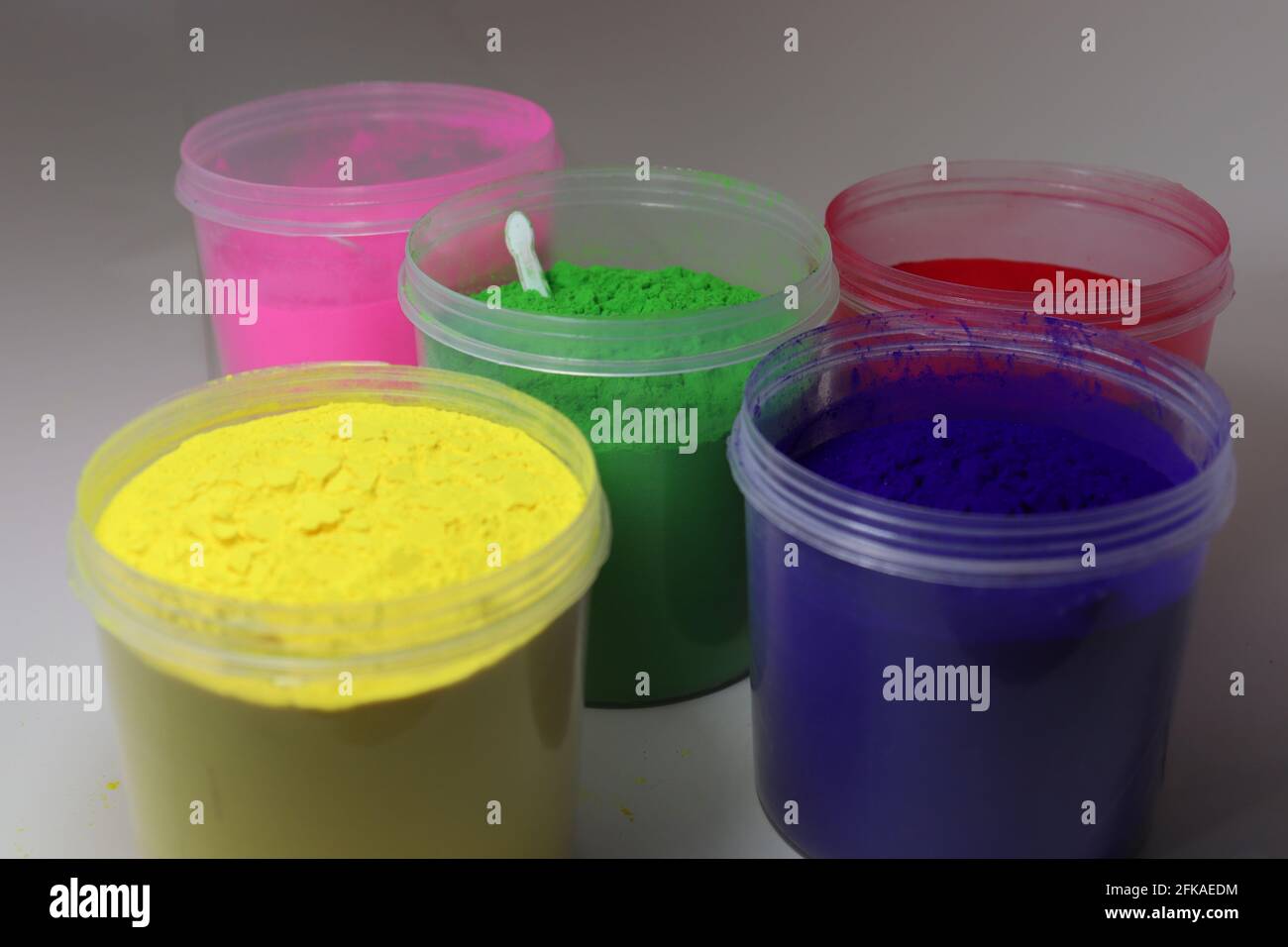 multiple colored powder stock on plastic pot for holiday Stock Photo ...