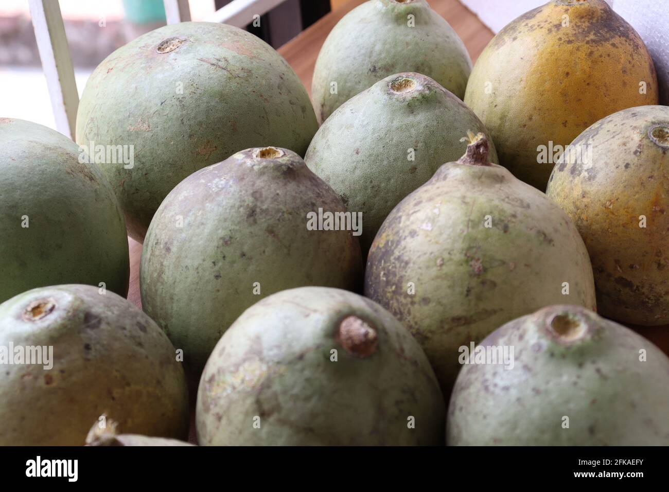 green colored ripe wood apple stock on shop for sell Stock Photo - Alamy