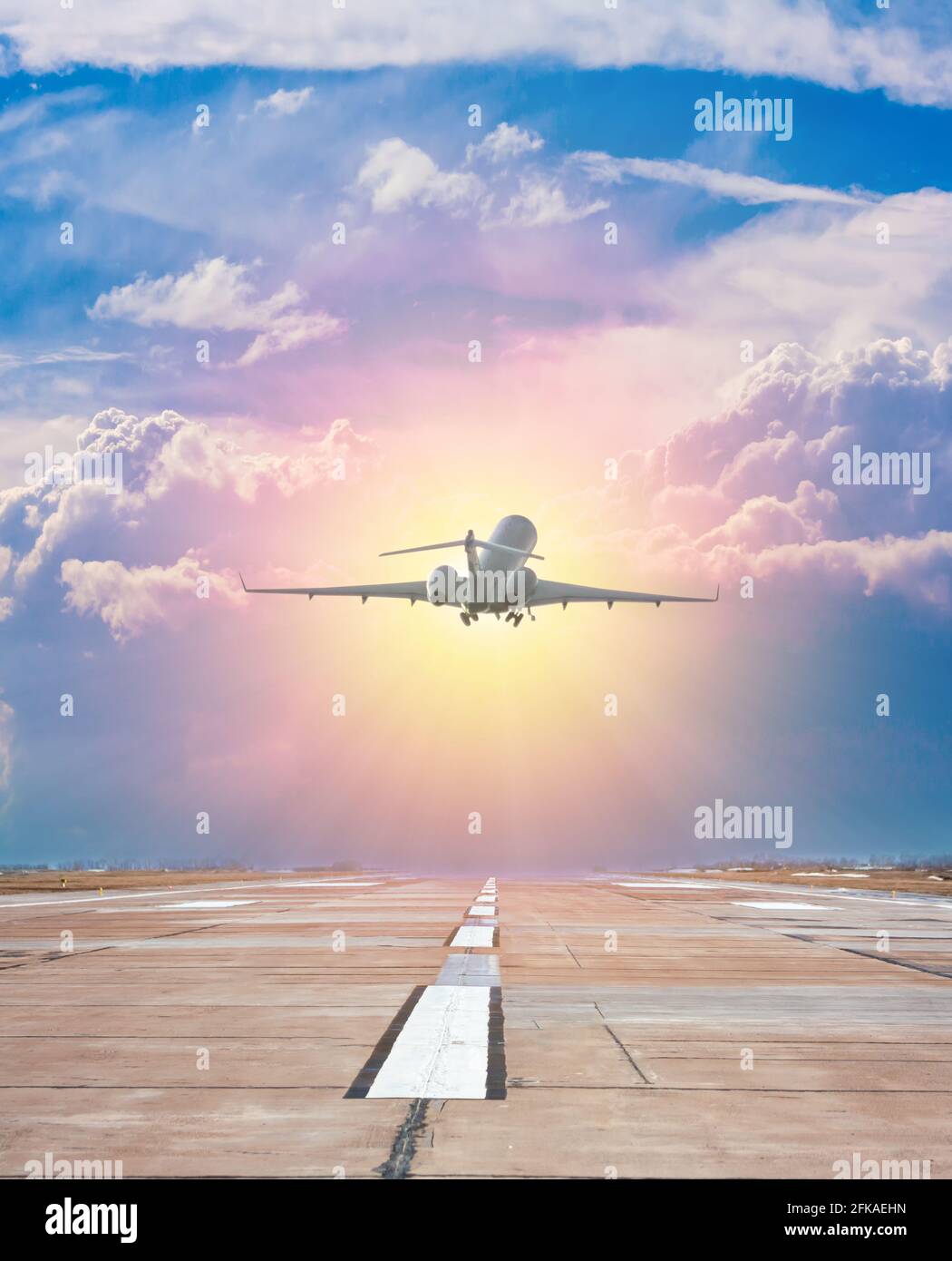 Corporate business jet take off from airport runway against the ...