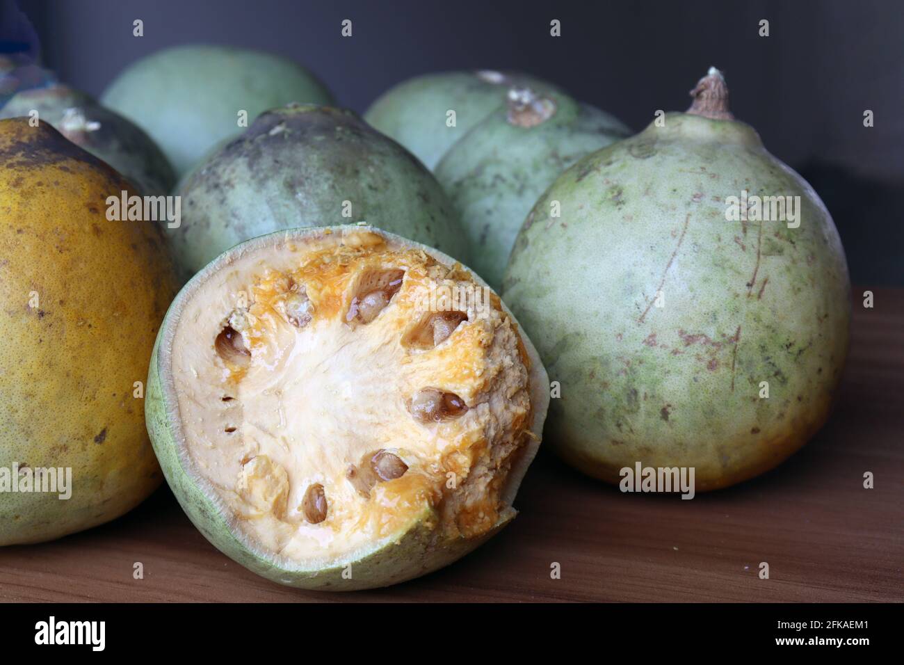 green colored ripe wood apple stock on shop for sell Stock Photo - Alamy