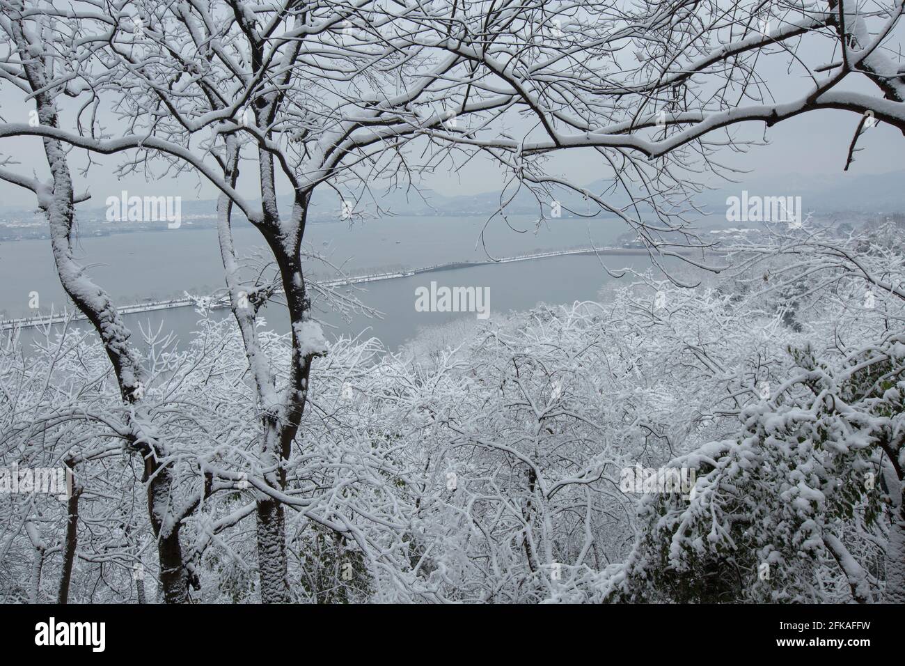 Hangzhou west lake scenery after a snow Stock Photo - Alamy