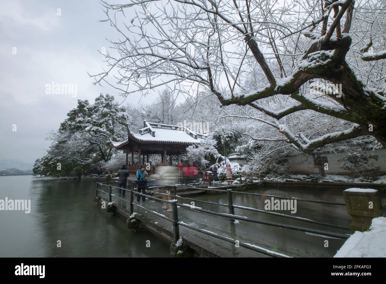 Hangzhou west lake scenery after a snow Stock Photo - Alamy